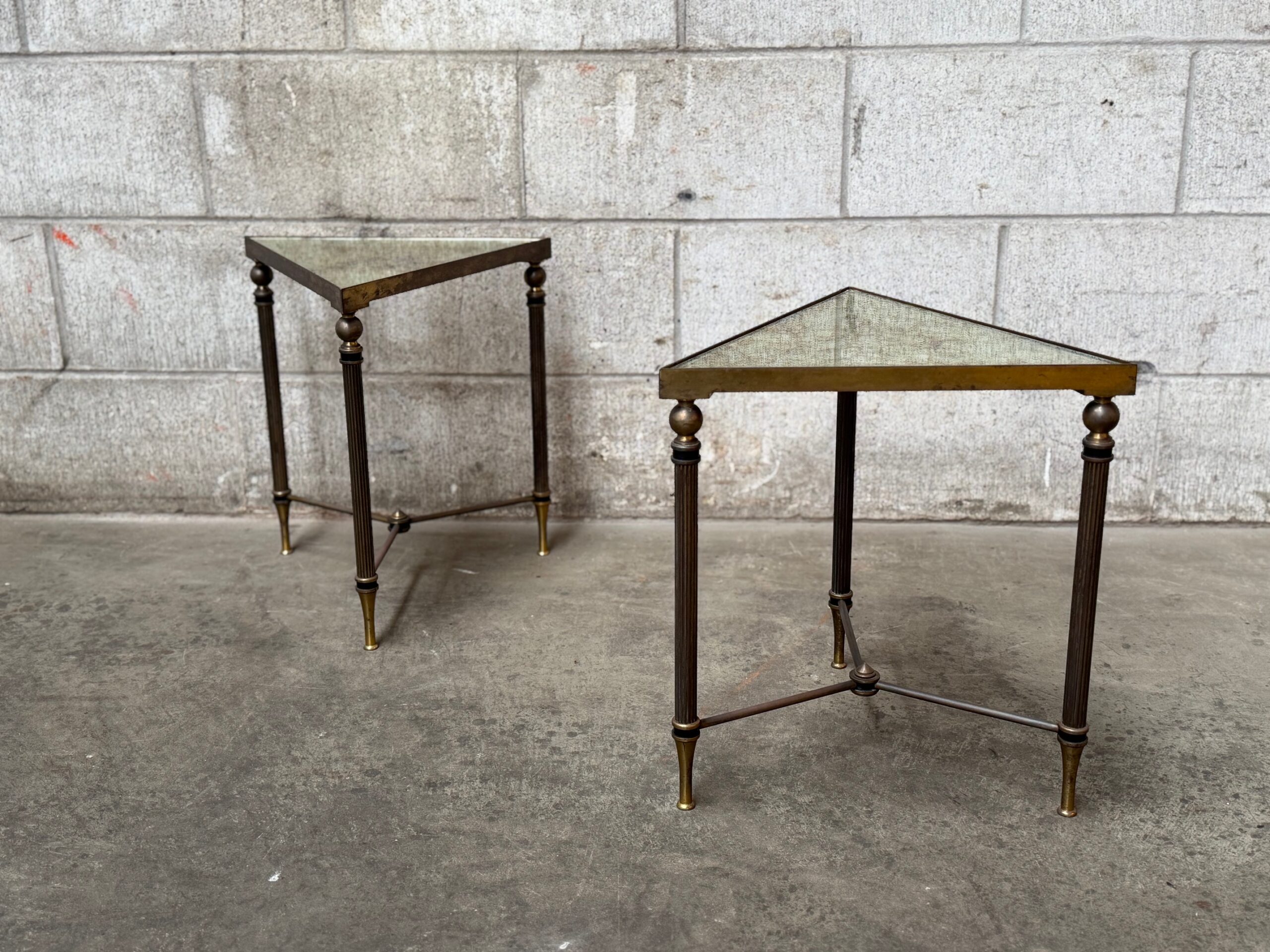 A pair of metal & glass triangle side tables in Sold | Vitrine